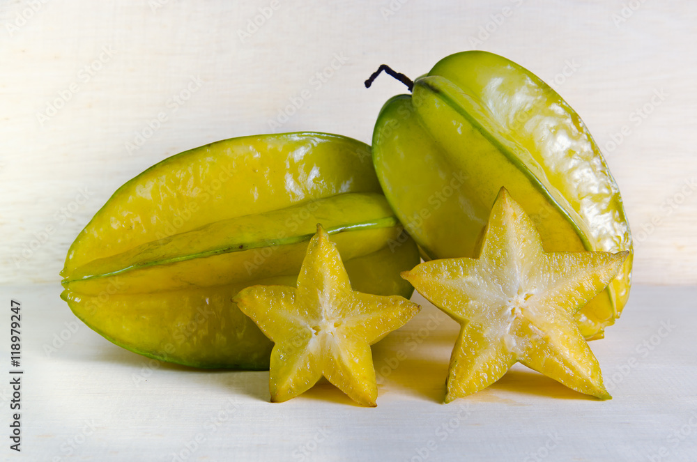 Star apple fruit with half cross section isolated on wooden boar Stock ...