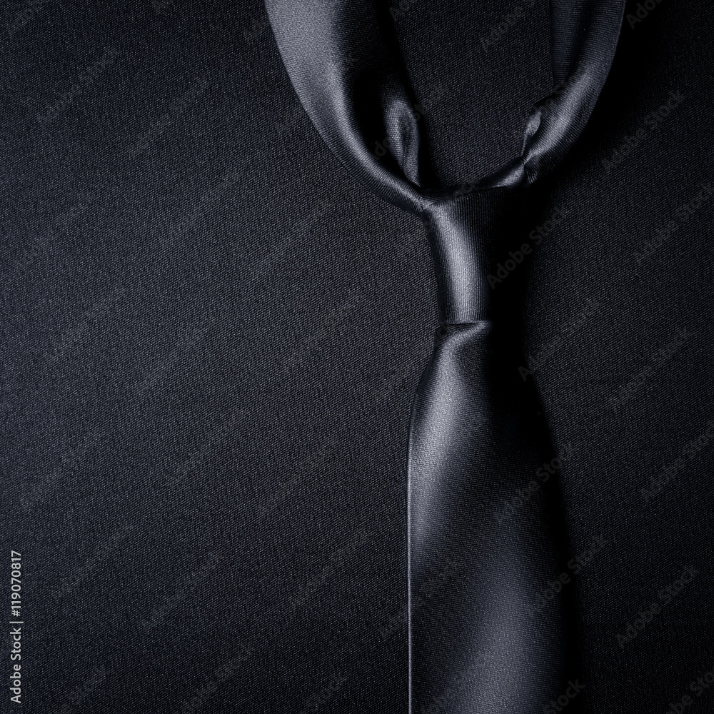 black tie on a black background Stock Photo | Adobe Stock