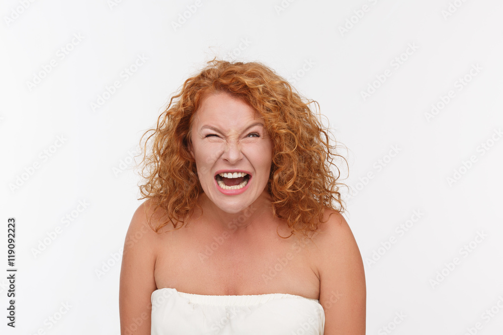 Mature Caucasian woman yelling with angry expression. Picture of ...