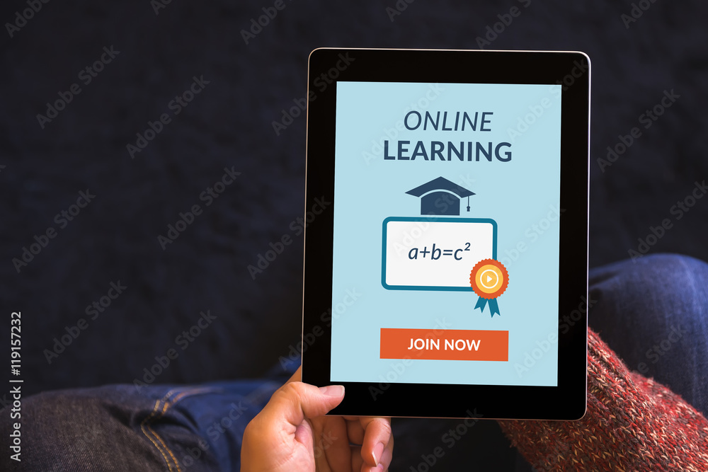 Hands holding tablet computer with online learning concept on screen ...