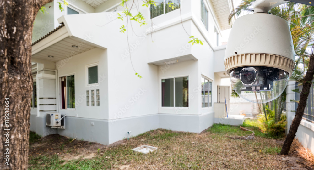 CCTV camera or surveillance operating in home back yard Stock Photo ...