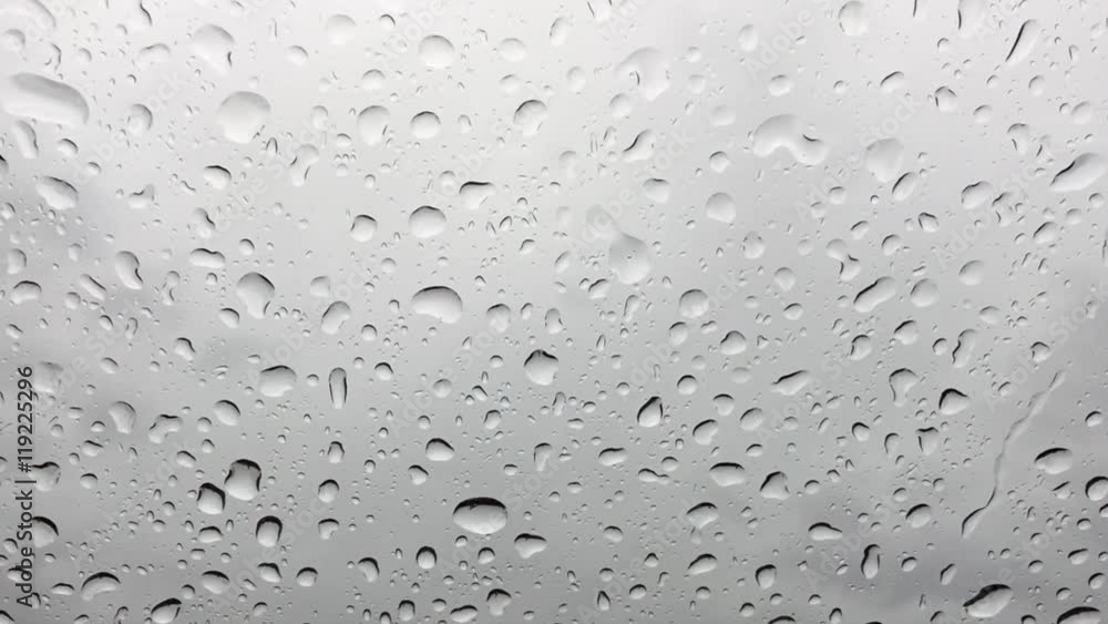 Close up of water drops running on car windshield Stock Video | Adobe Stock