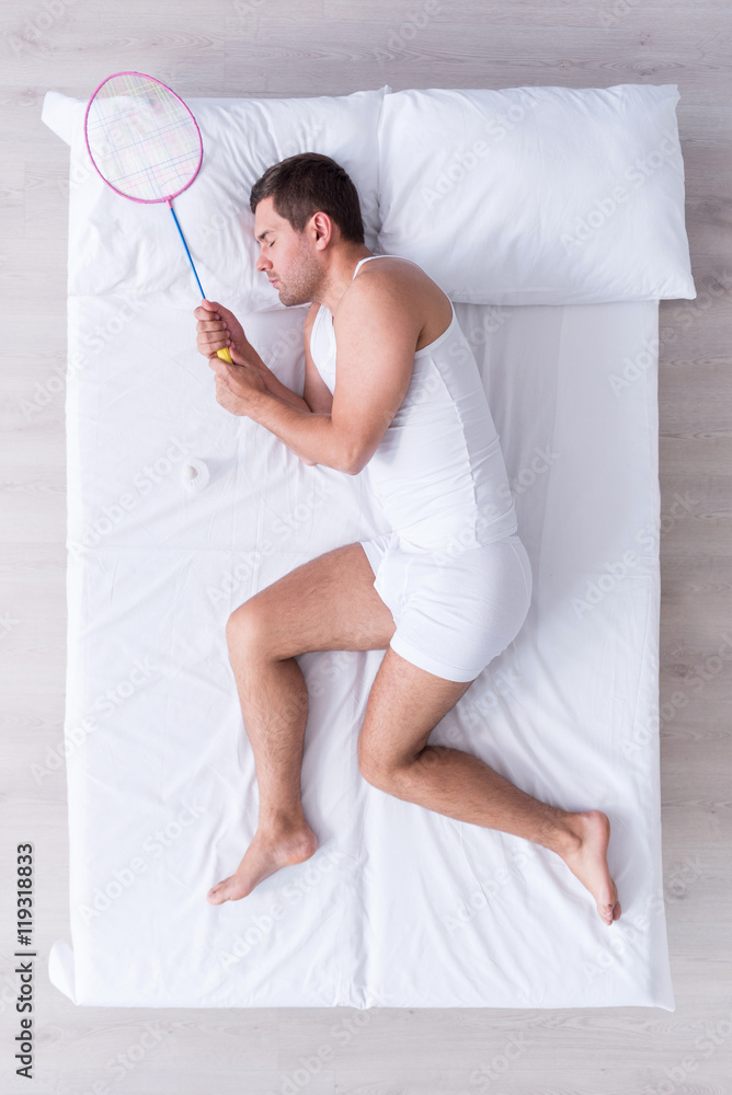 Handsome young man sleeping on bed Stock Photo | Adobe Stock