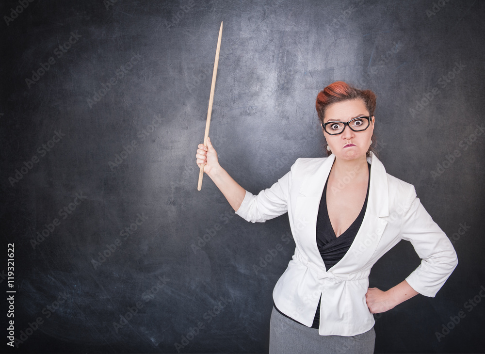 Angry teacher with pointer Stock Photo | Adobe Stock