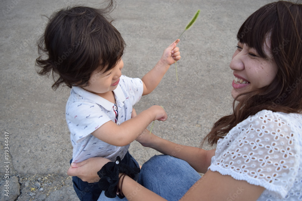 mother and her son are palying outer place Stock Photo | Adobe Stock