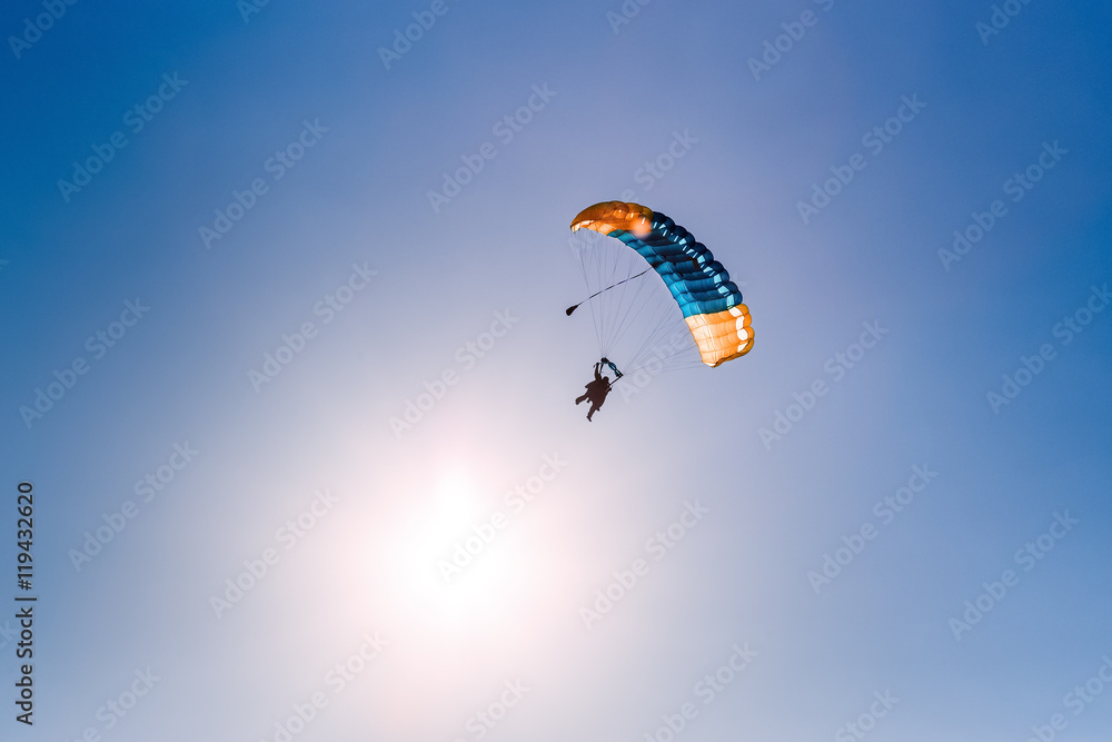 Silhouette of parachute on sunset background Stock Photo | Adobe Stock