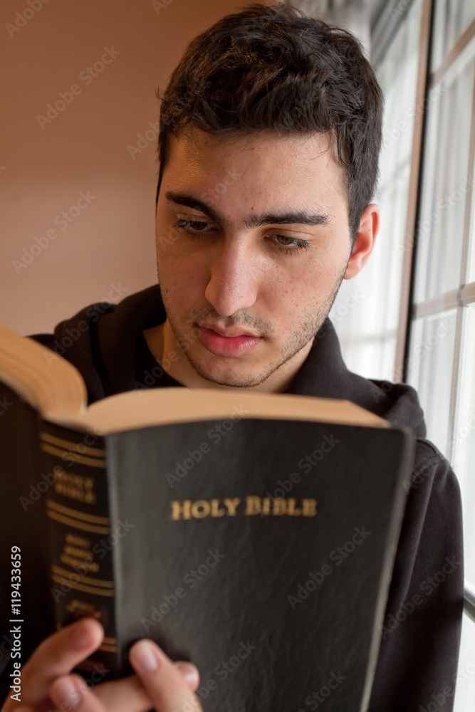Young Man Reading Bible