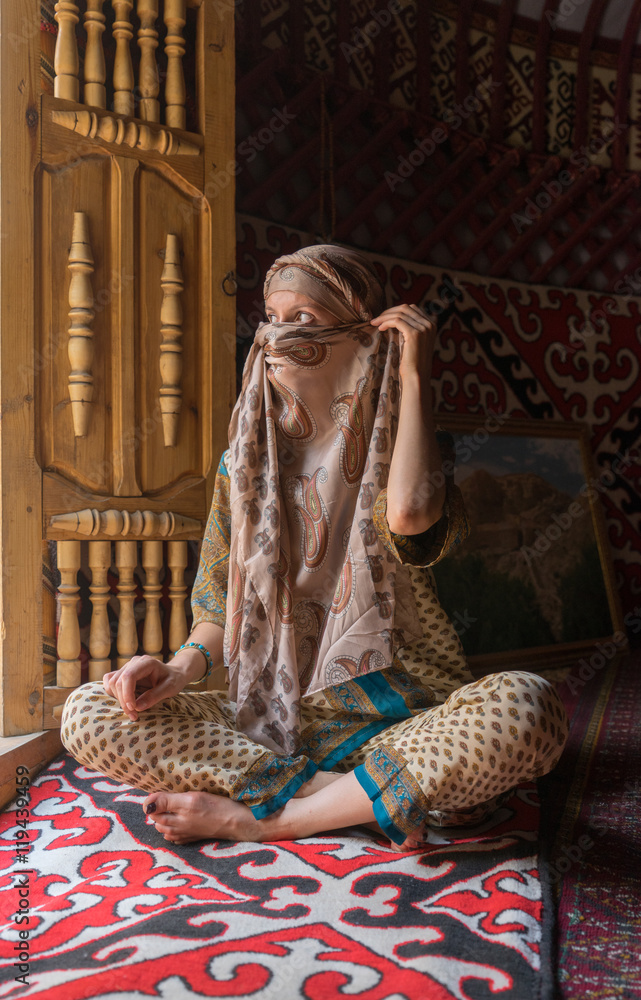 Women of Central Asia in national costume: covers the face Stock Photo ...