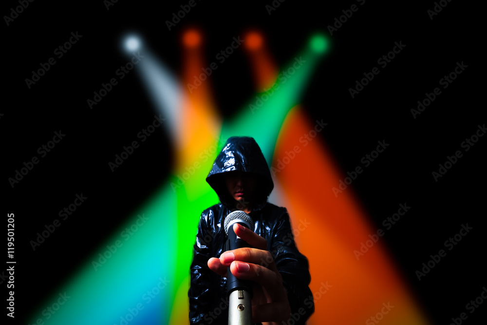 asian male vocalist singing & spotlight background Stock Photo | Adobe ...