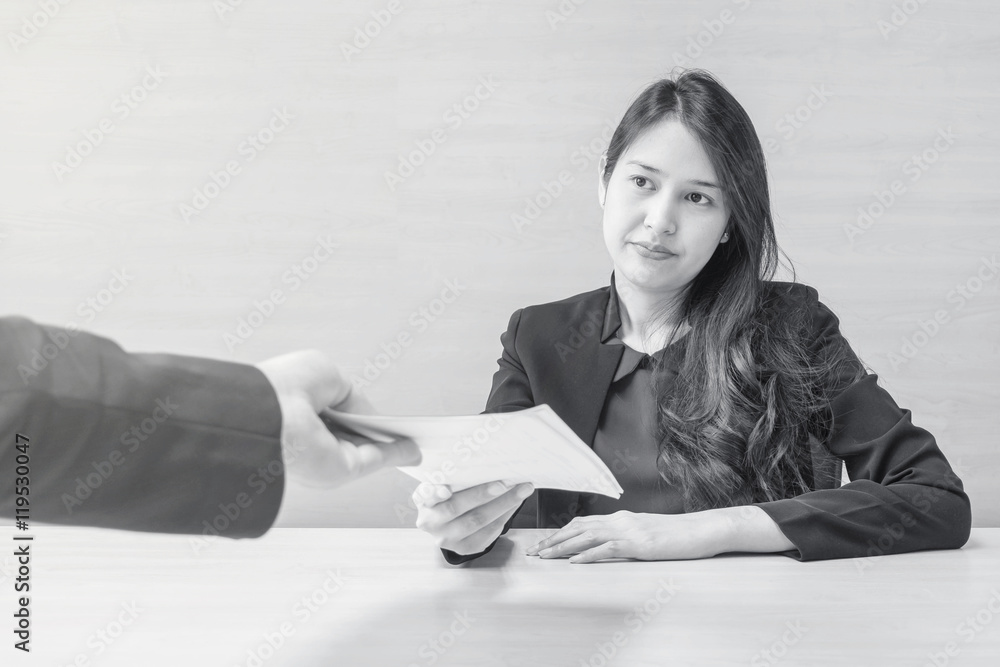 Closeup asian working woman receive work document from her boss with ...