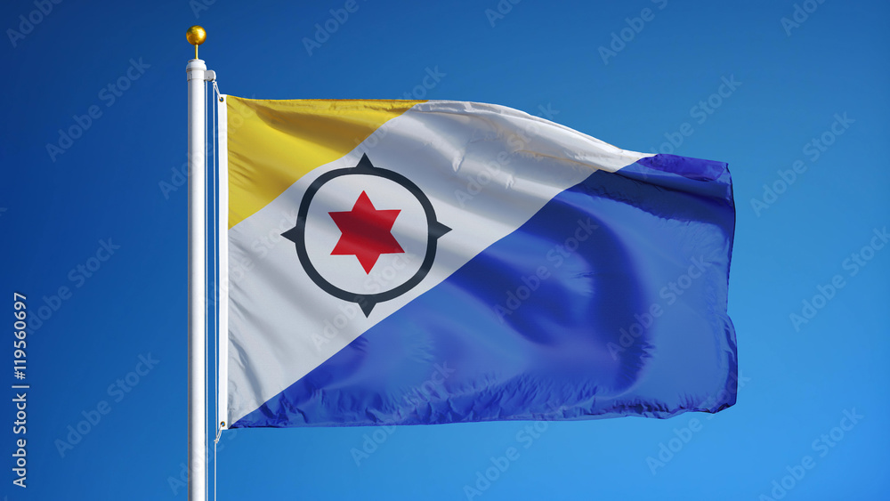 Bonaire flag waving against clean blue sky, close up, isolated with ...