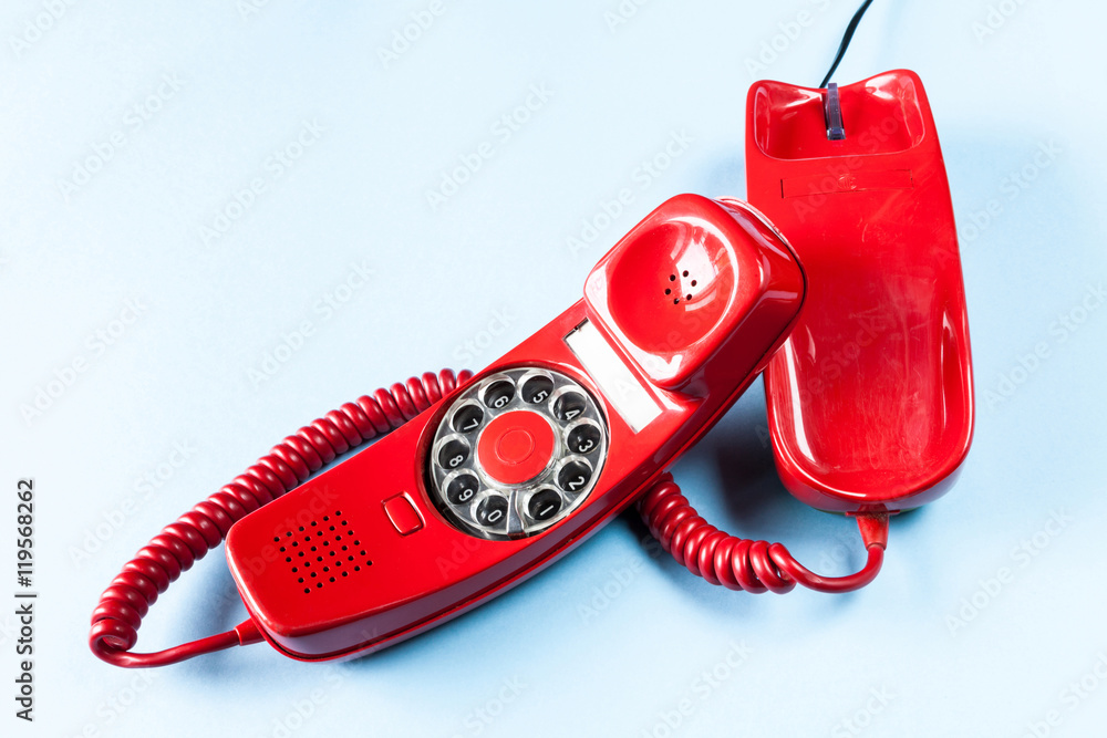 Old red phone off the hook Stock Photo | Adobe Stock