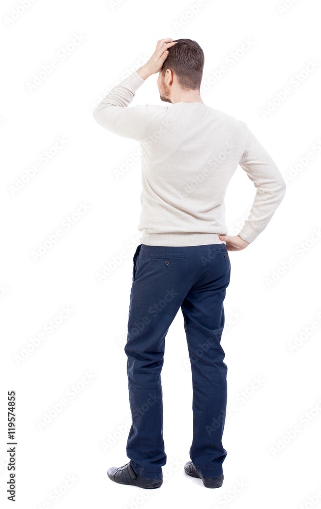 Back view of man . Standing young guy. bearded man in a white warm ...