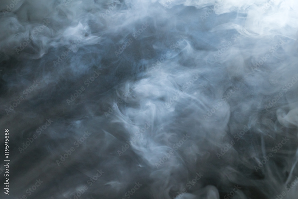 The stream of thick smoke on a dark background Stock Photo | Adobe Stock