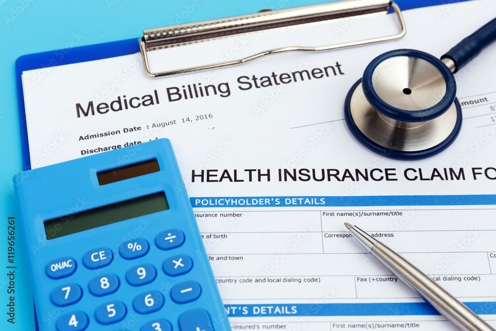 Health insurance claim form with calculator Stock Photo | Adobe Stock