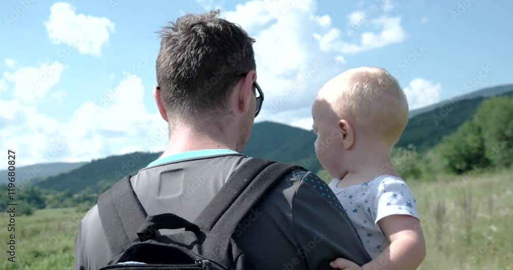 Little Child Being Carried by His Father Outside in the Field Stock ...