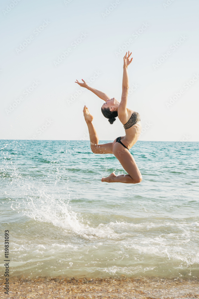 Fotografia do Stock: Photograph of a beautiful female dancer jumping on ...