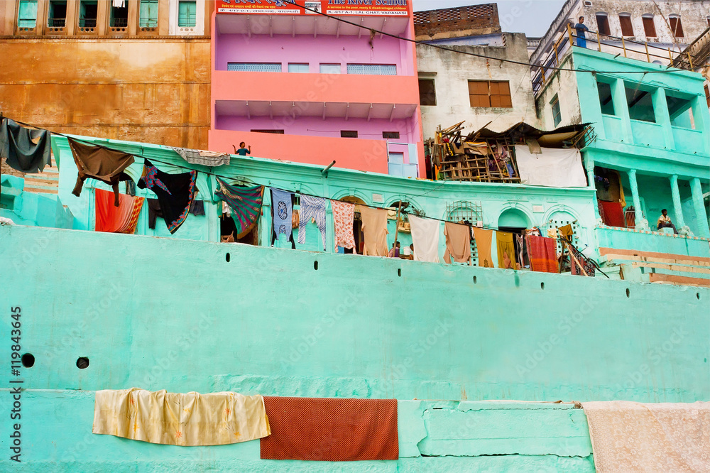Indian homes of poor people with balconies and laundry drying in ...