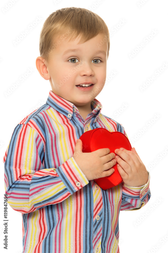 Little boy holding heart Stock Photo | Adobe Stock