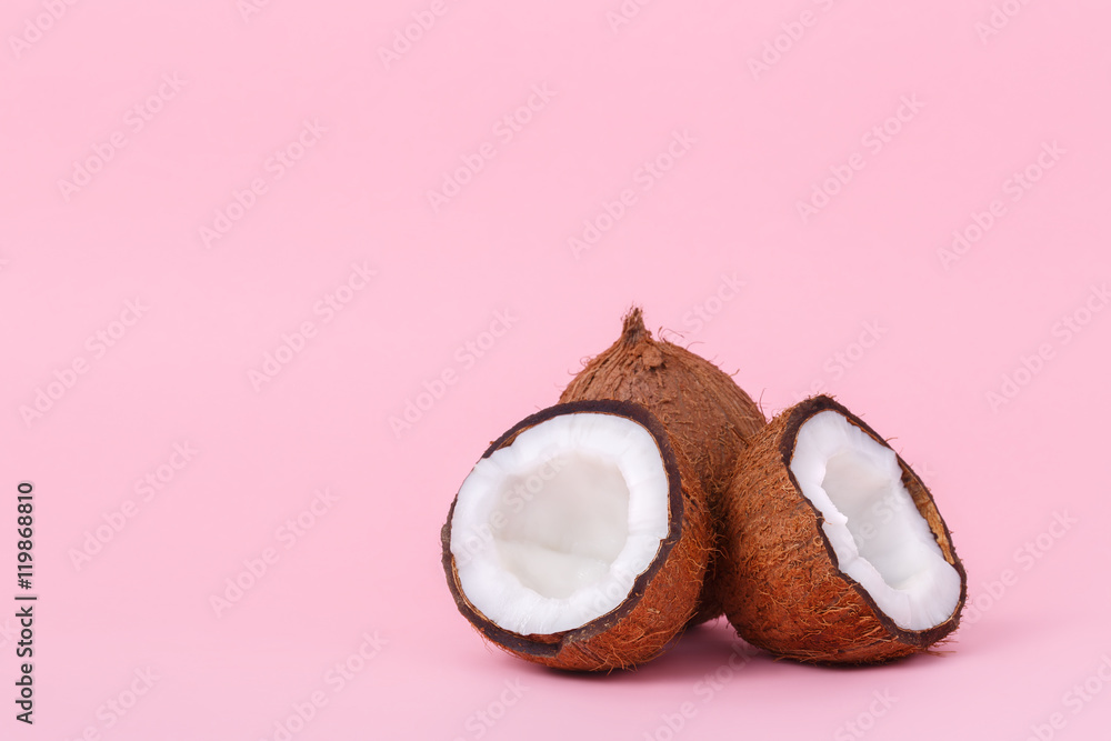 Coconut on pink background. Minimal style. Two halves of coconut Stock ...