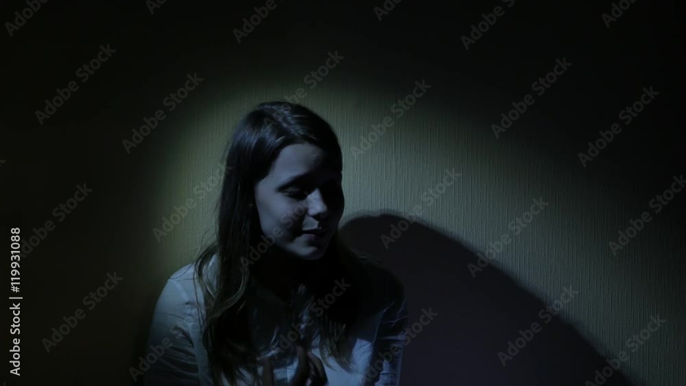 Scared teen girl in a dark. 4K UHD. Stock Video | Adobe Stock