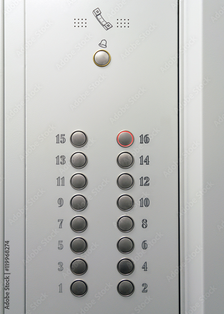 Elevator metal control panel with round buttons with numbers of floors ...