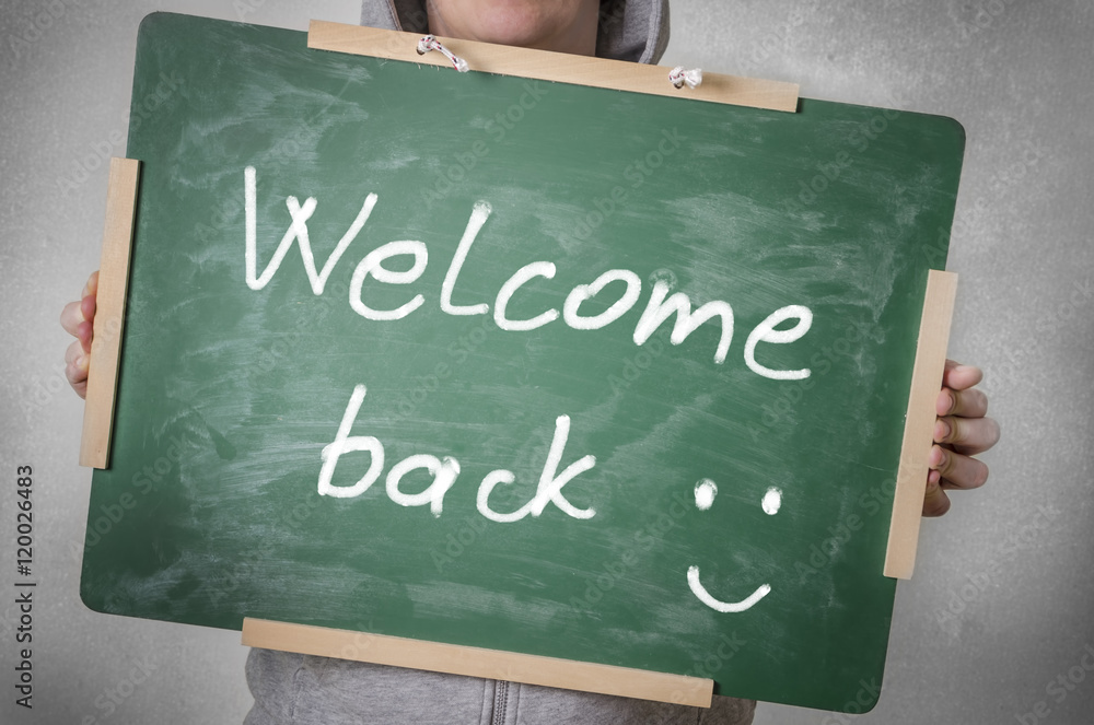 Welcome back written on chalkboard Stock Photo | Adobe Stock