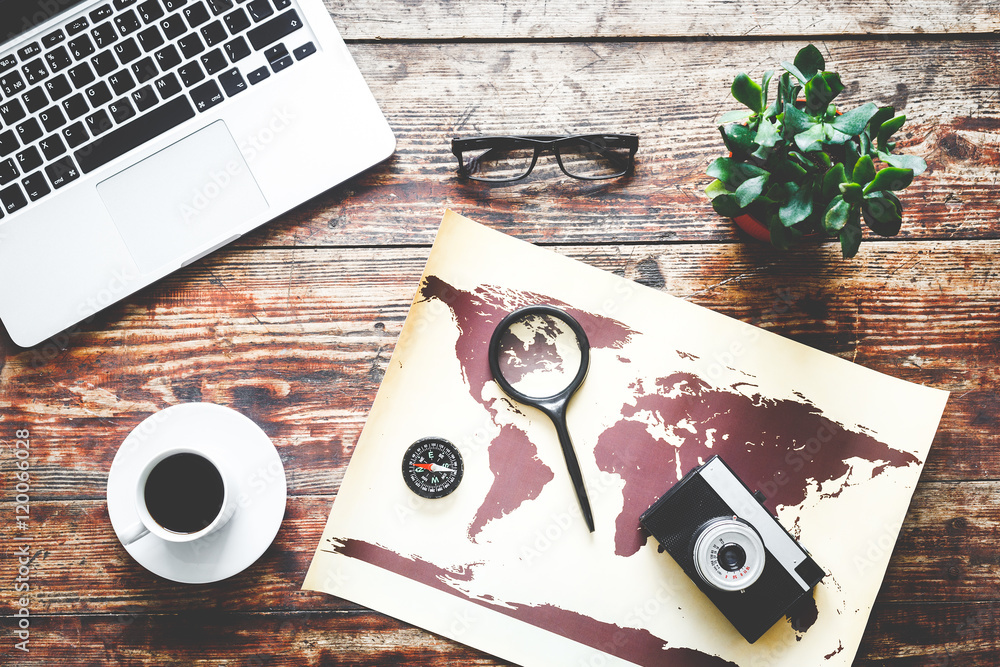 world map on with laptop wooden table top view Stock Photo | Adobe Stock