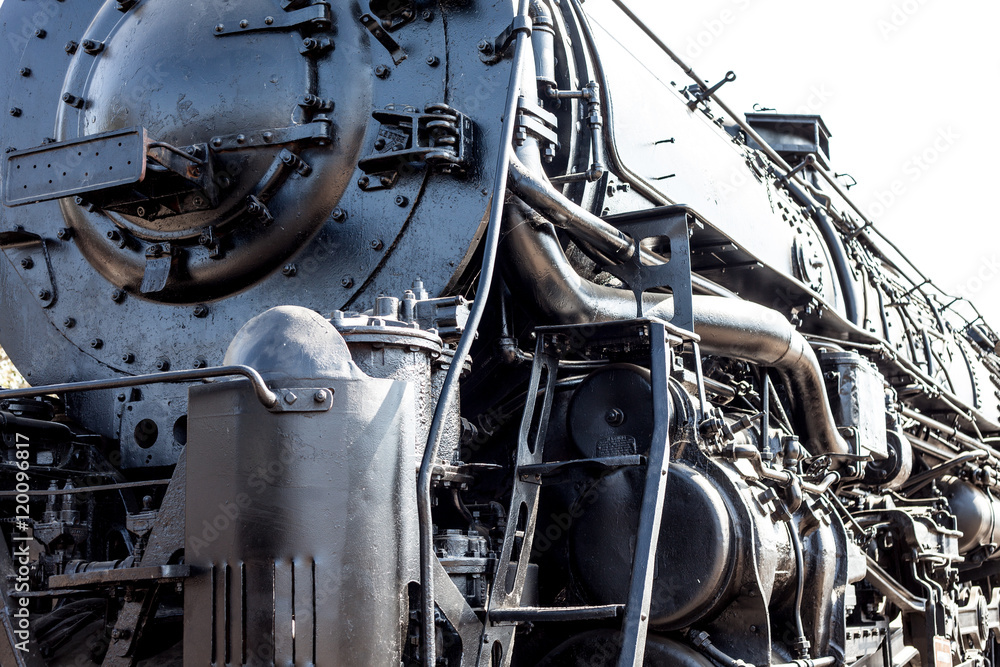 Detail of steam train engine; the strength and power of metal ...