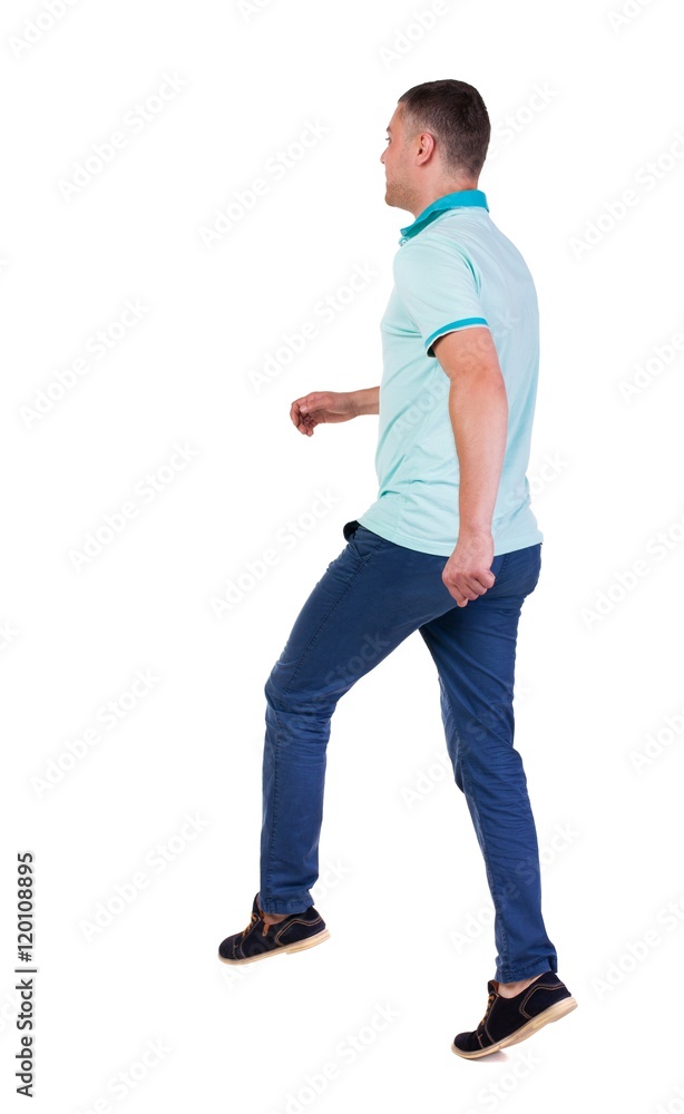 Back view of running man in blue polo. Walking guy in motion. Rear view ...