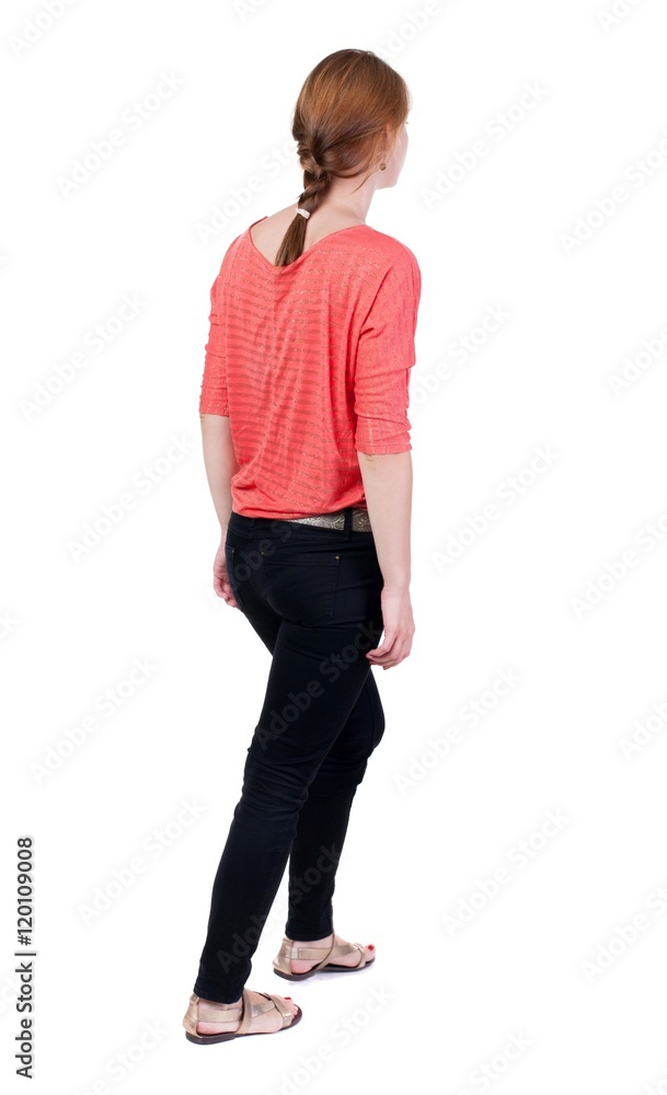 back view of walking woman in jeans. beautiful blonde girl in motion ...