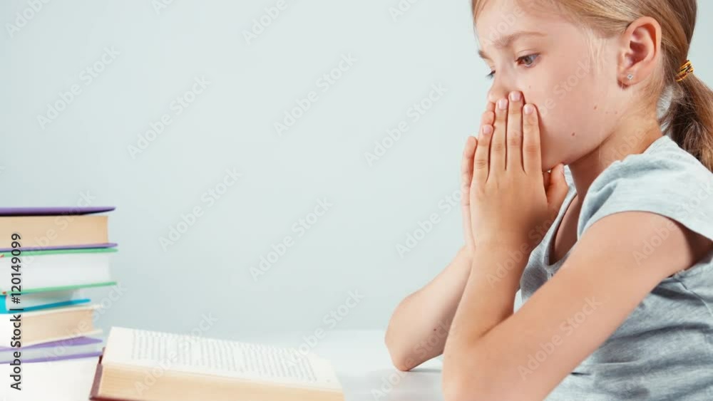 Portrait profile child reading book and shocking Stock Video | Adobe Stock