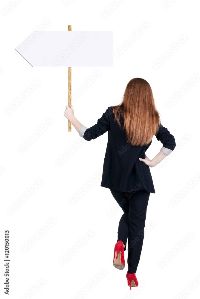 Back view business woman showing sign board. young redhead girl holds ...