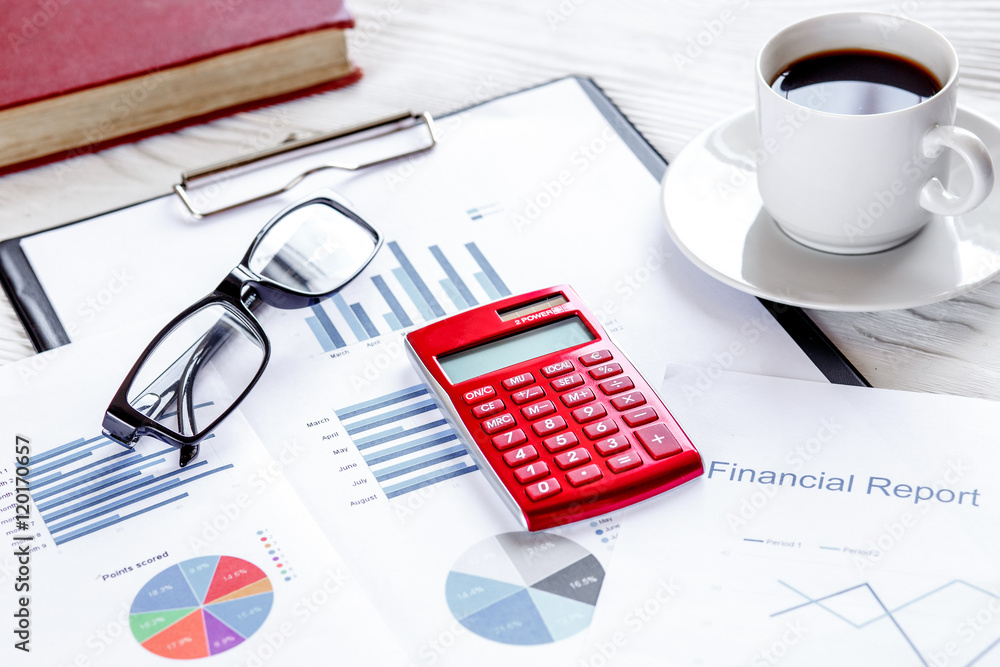 economist table with report Stock-Foto | Adobe Stock