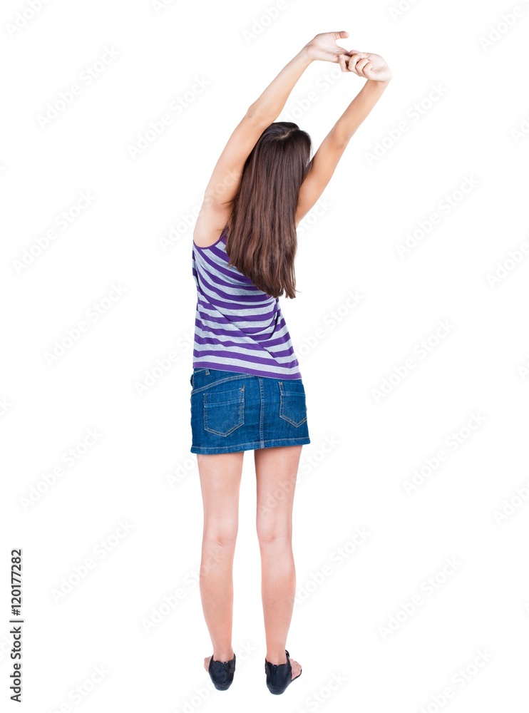back view of standing young beautiful brunette woman thumbs up. girl ...