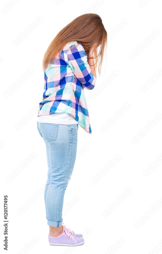 Back view of shocked woman in blue jeans jacket. girl hid his eyes ...