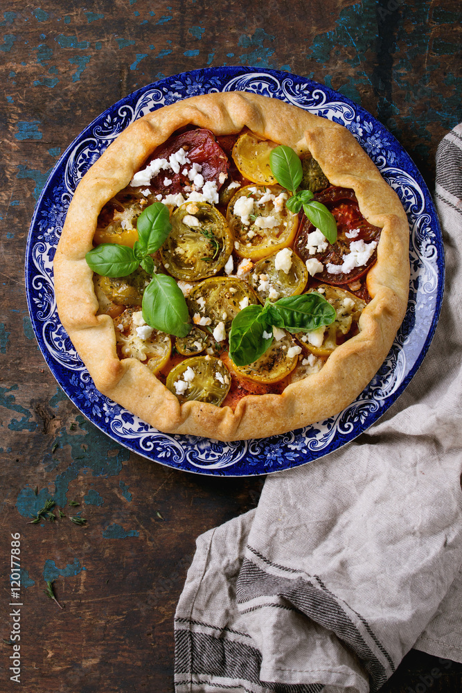 Open pie with party-colored tomatoes Stock Photo | Adobe Stock