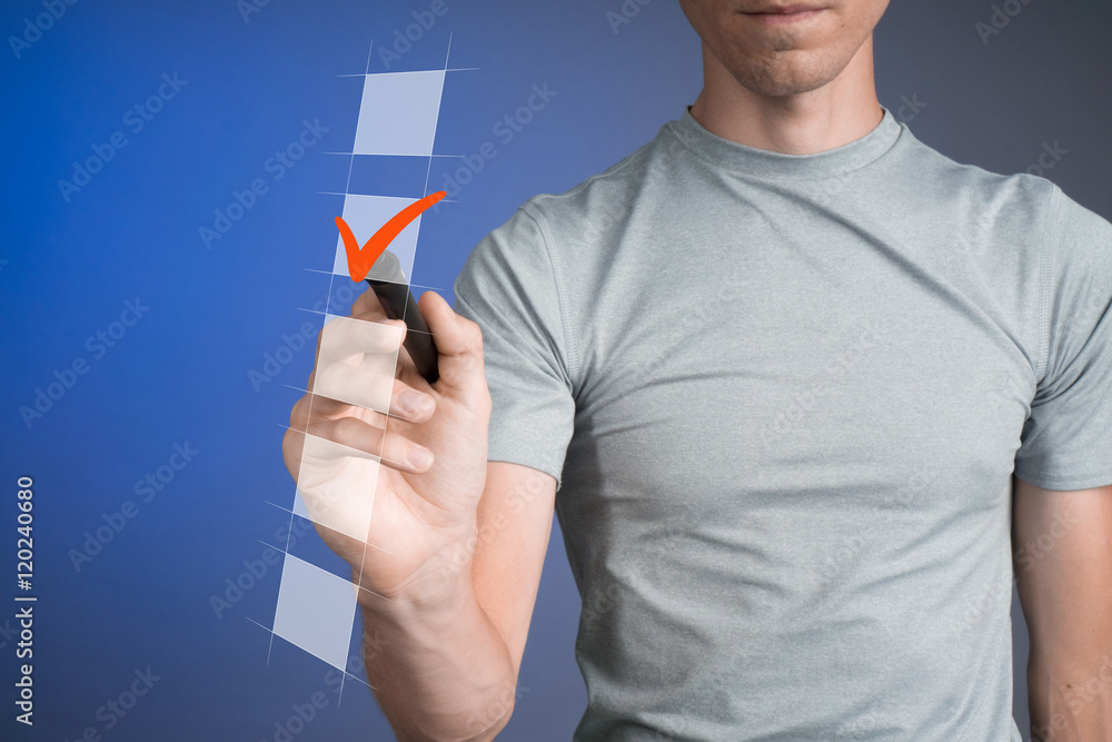 Young man t-shirt checking on checklist box. Blue background. Stock ...