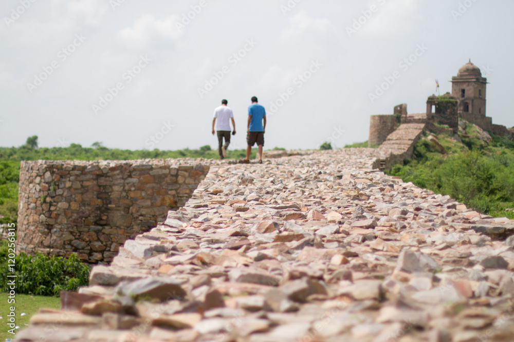 The historical ruins of the now famous Bhangarh Fort with ruins of ...