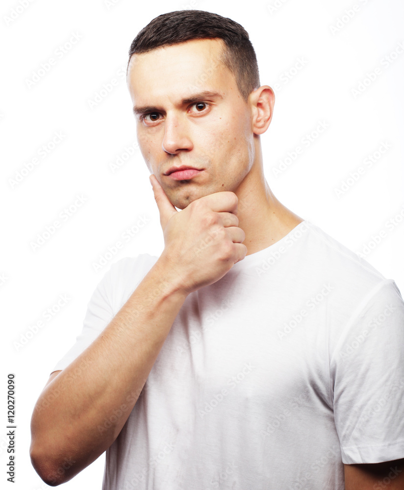 Portrait of handsome young thoughtful man isolated over white ba Stock ... Portrait of handsome young thoughtful man isolated over white ba Stock ...