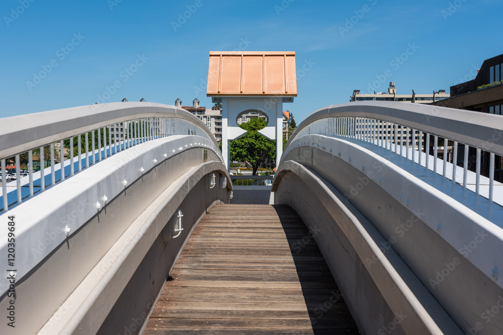Curved, arched bridge on world's longest floating boardwalk in Coeur d ...