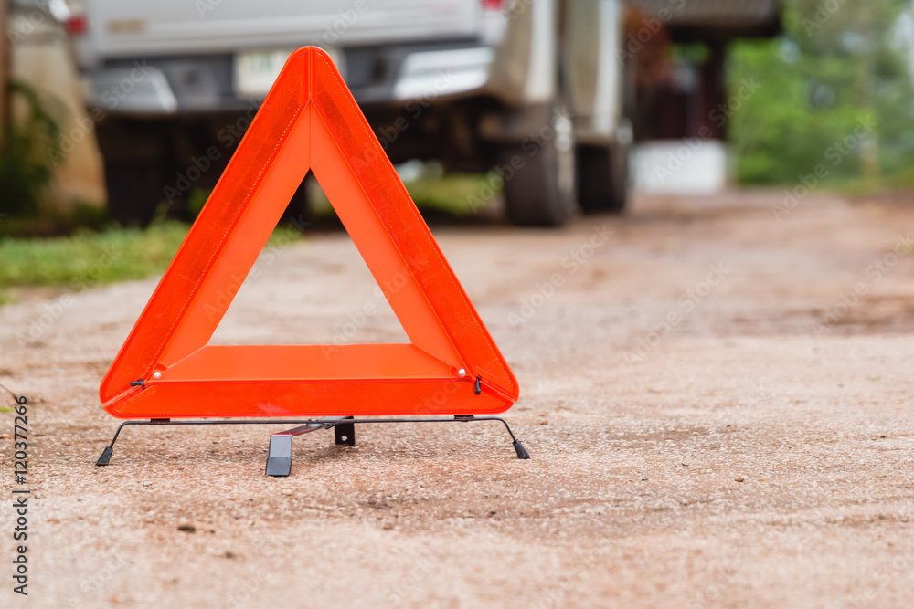 Triangle Red emergency stop sign, broken, damaged cars parked on the ...