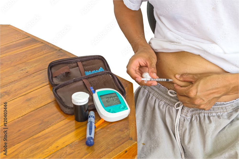 Male diabetes patient gets an insulin injection in abdomen area and ...