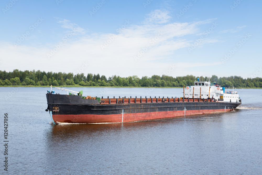 River cargo ship goes along the Volga River Stock Photo | Adobe Stock