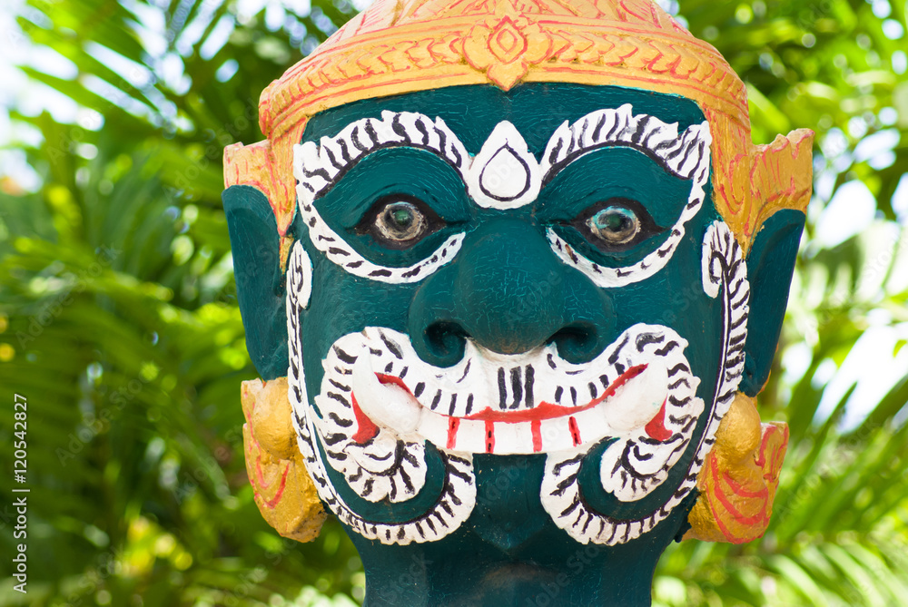 Carved face of a statue. Temple in Thailand Stock Photo | Adobe Stock