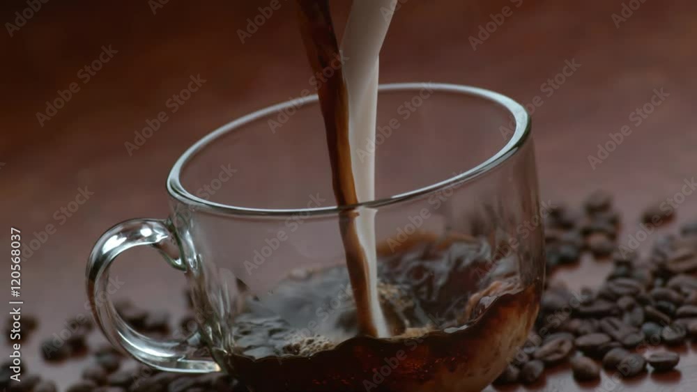 Coffee and creamer pouring together in slow motion Stock Video | Adobe ...