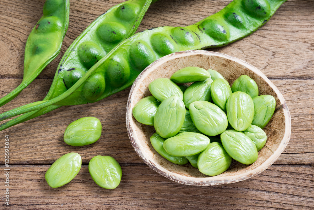 fresh and ripe prakia speciosa or bitter bean, twisted cluster bean, stink bean ( Parkia ...