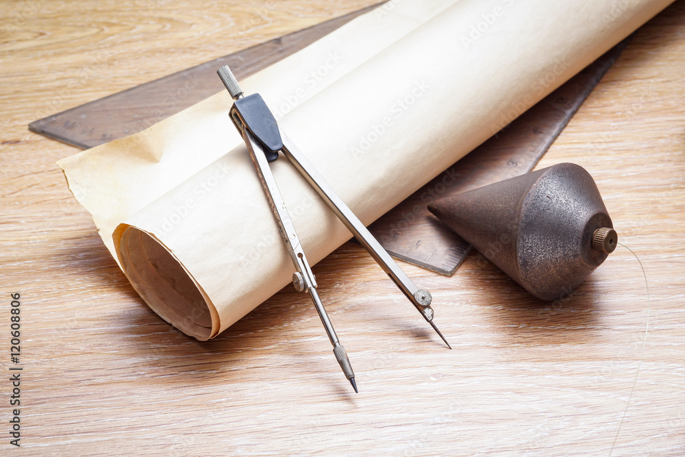 still life photography : old dividers, plummet, paper and geometry ...