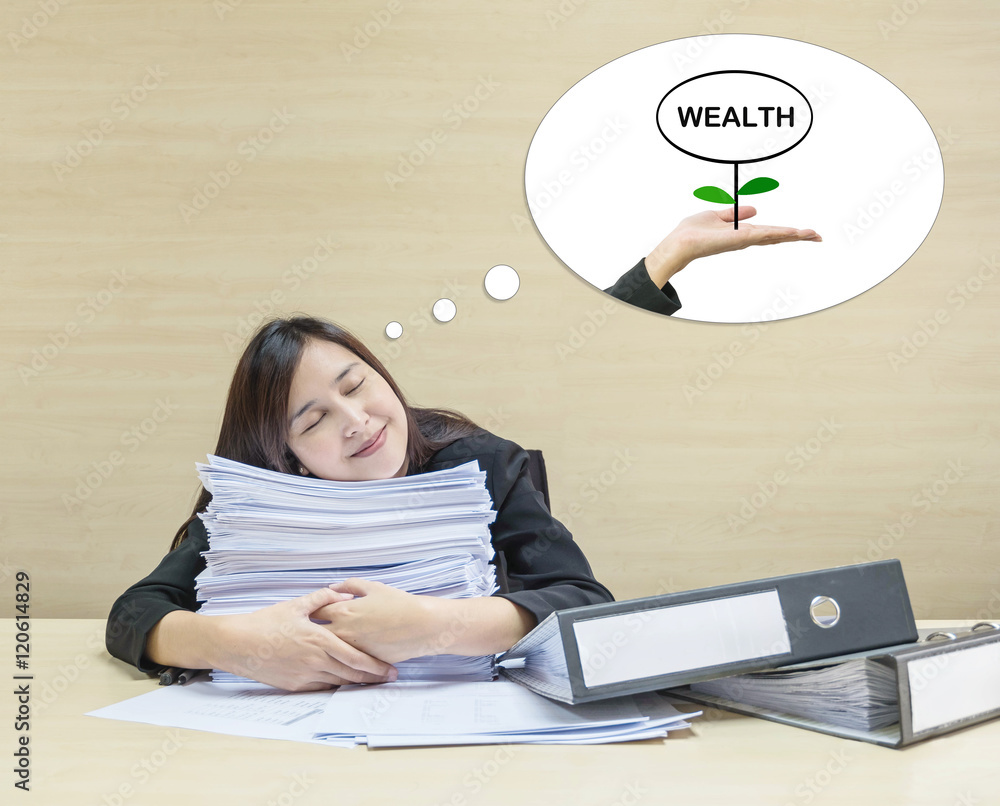 Closeup happy working woman sleeping with happy face with hug work ...