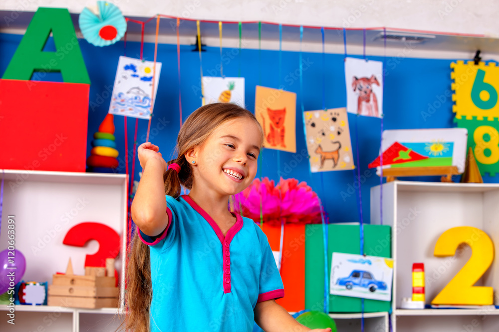Happy child girl laugh in primary school. A lot of child pictures in ...